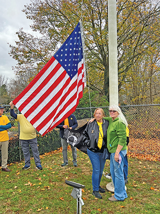 Highway overpass flag raised in honor of John J. Conway - Fairhaven ...